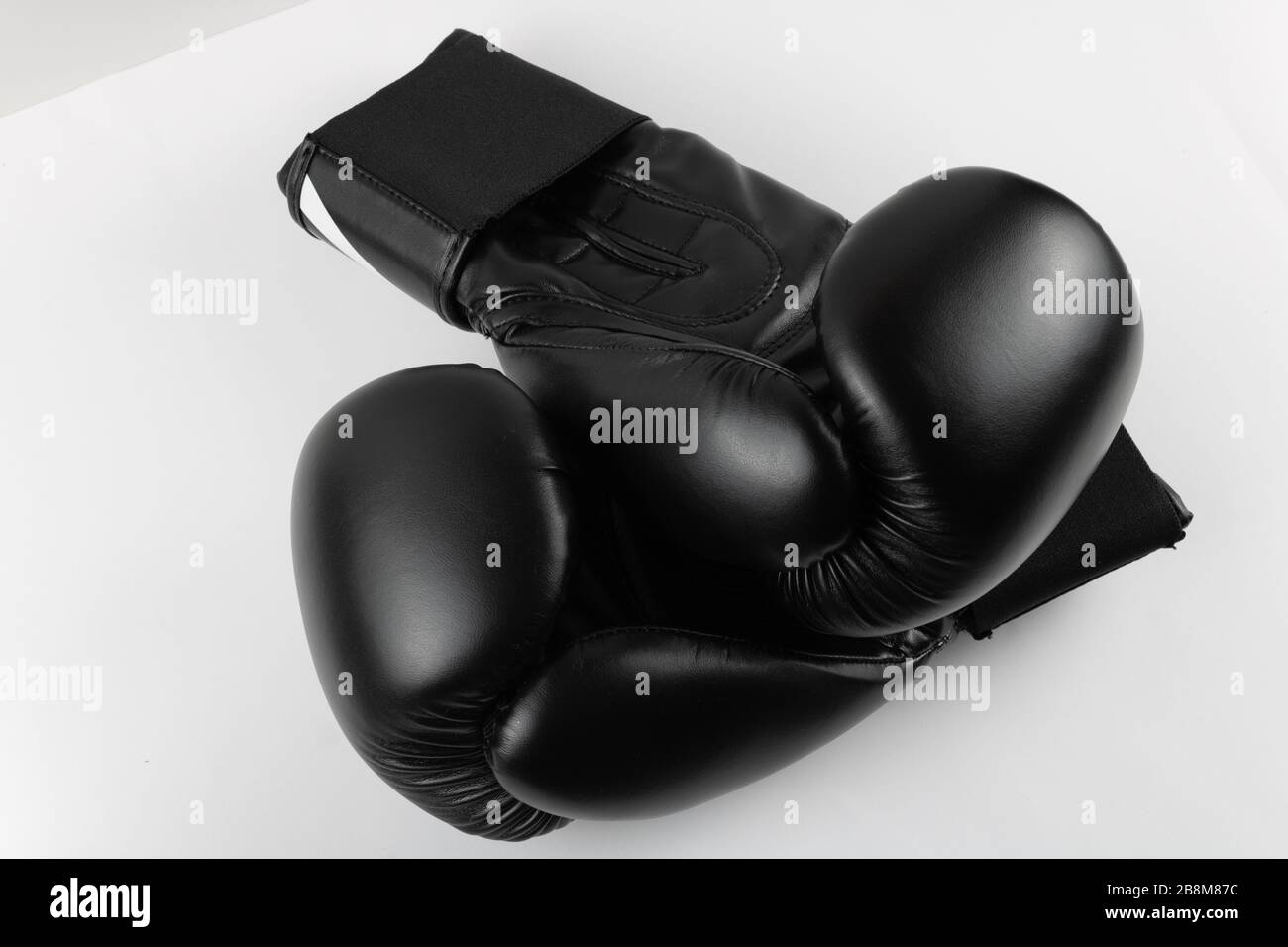 Black boxing gloves hi-res stock photography and images - Alamy