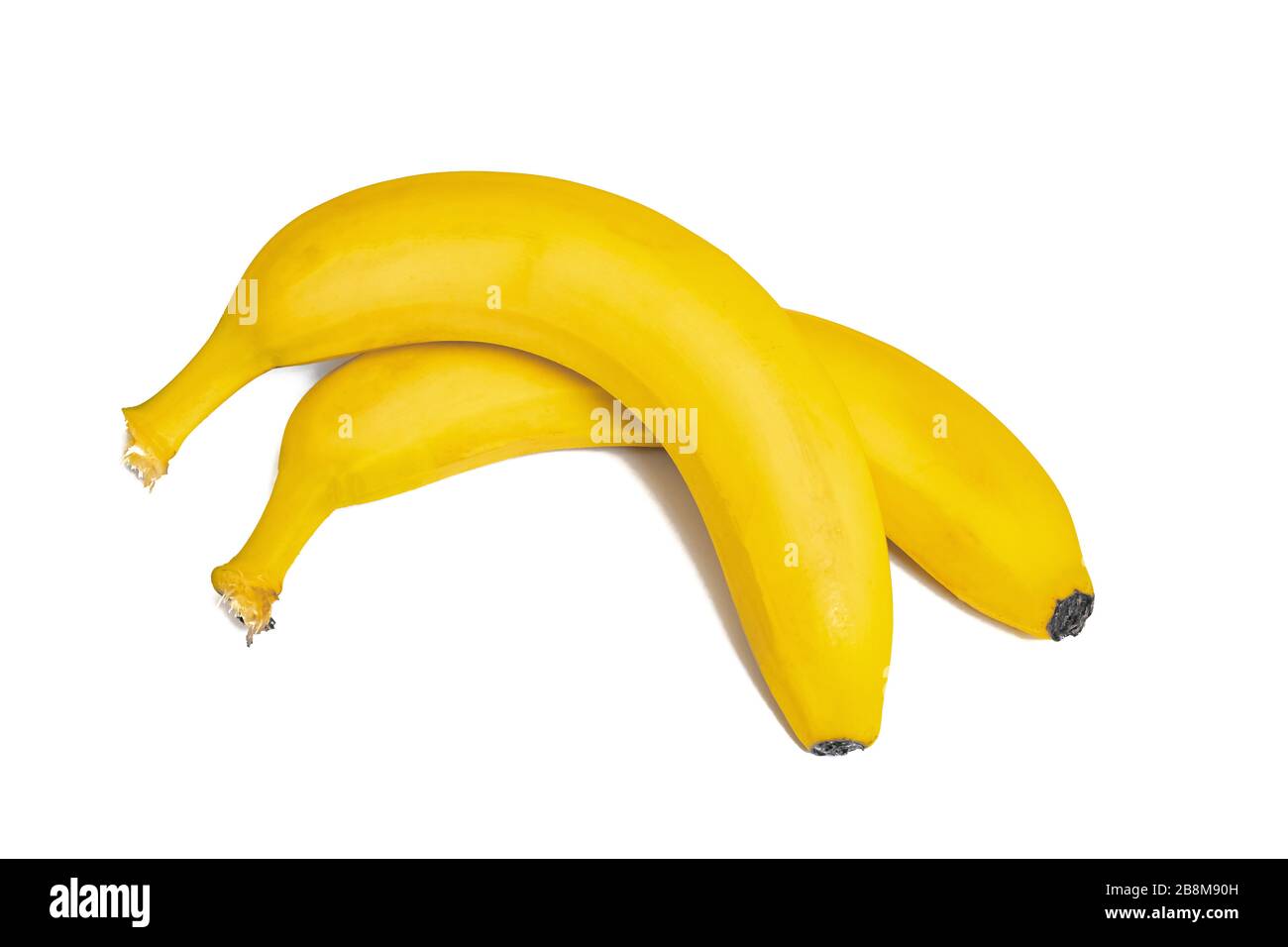 Two yellow bananas isolated on white background Stock Photo - Alamy