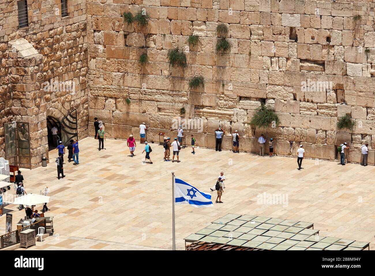View from above of plaza and people praying at Western Wall - holy ...