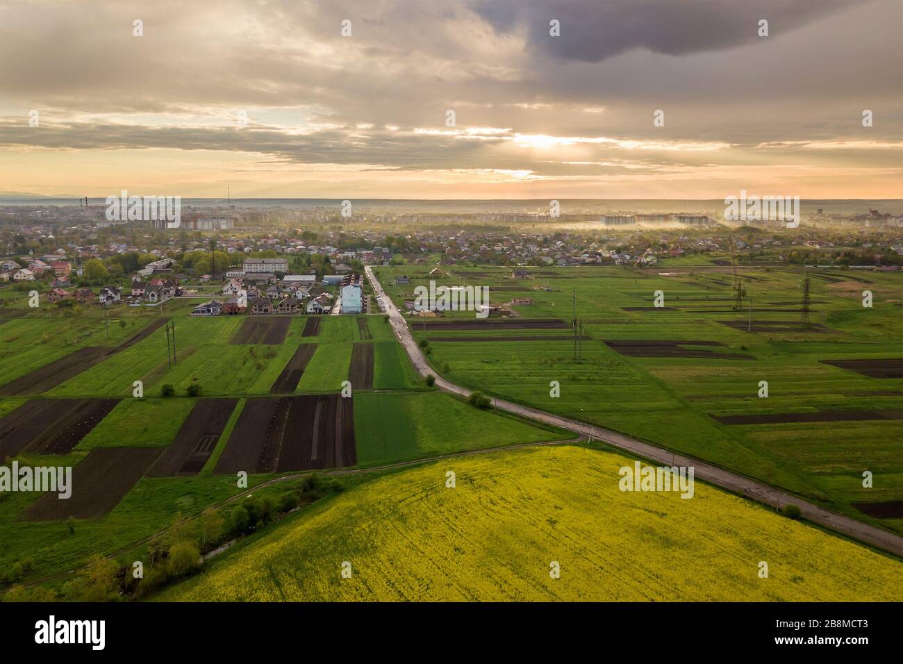 Rural landscape on spring or summer day. Aerial view of green, plowed ...