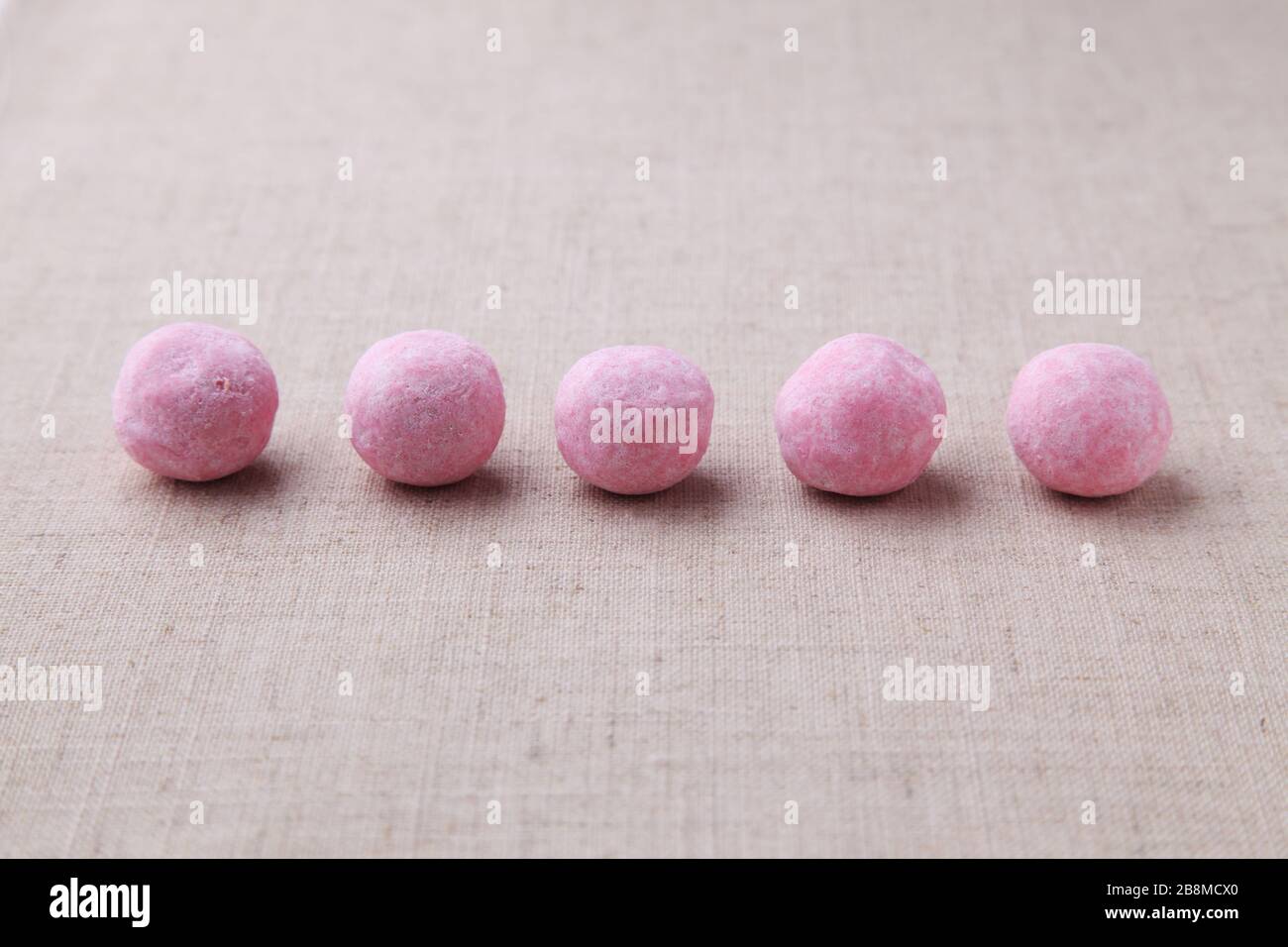 snowball cookies isolated on table cloth Stock Photo - Alamy