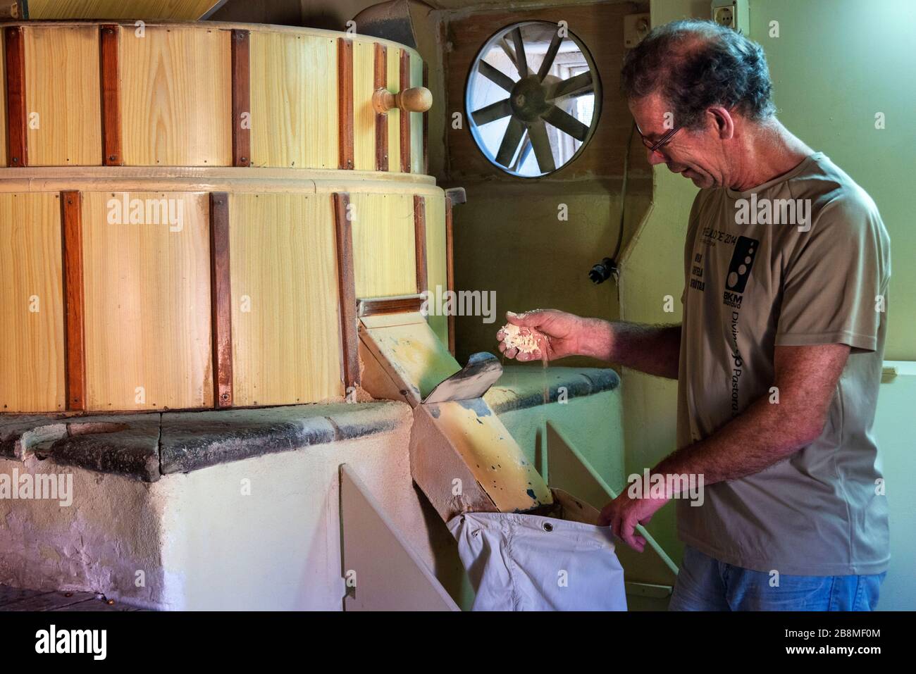Shop and old water driven mill where toasted corn is ground to make a ...