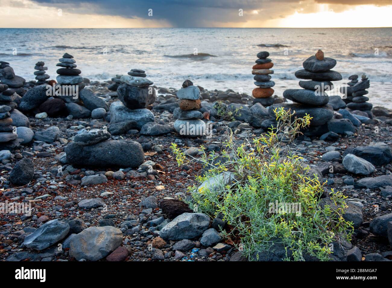 Art of stone balance or rock stones piles at Beach Playa de Caleta ...