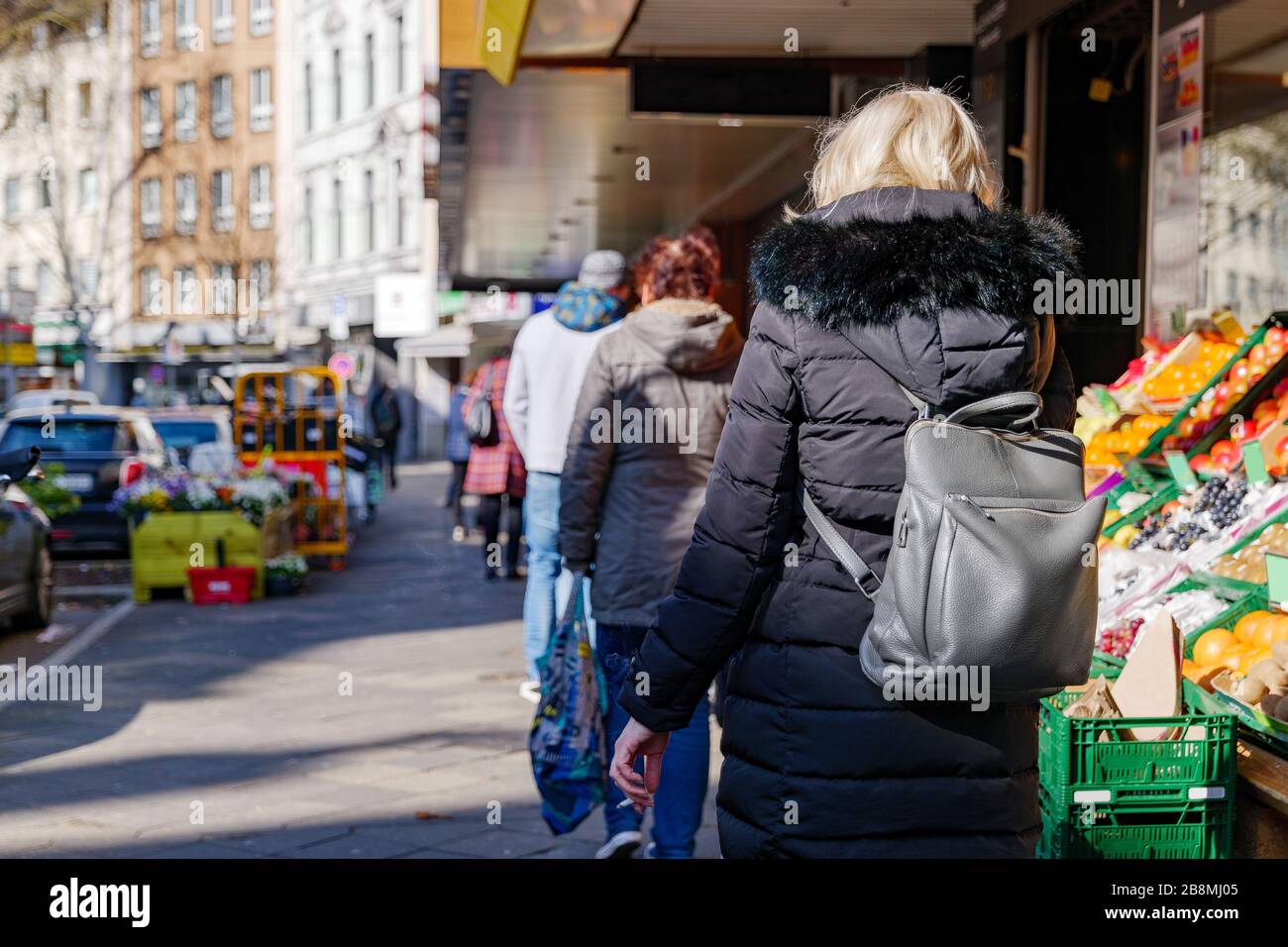 Selected focus, European people queue outside in front of food stall ...