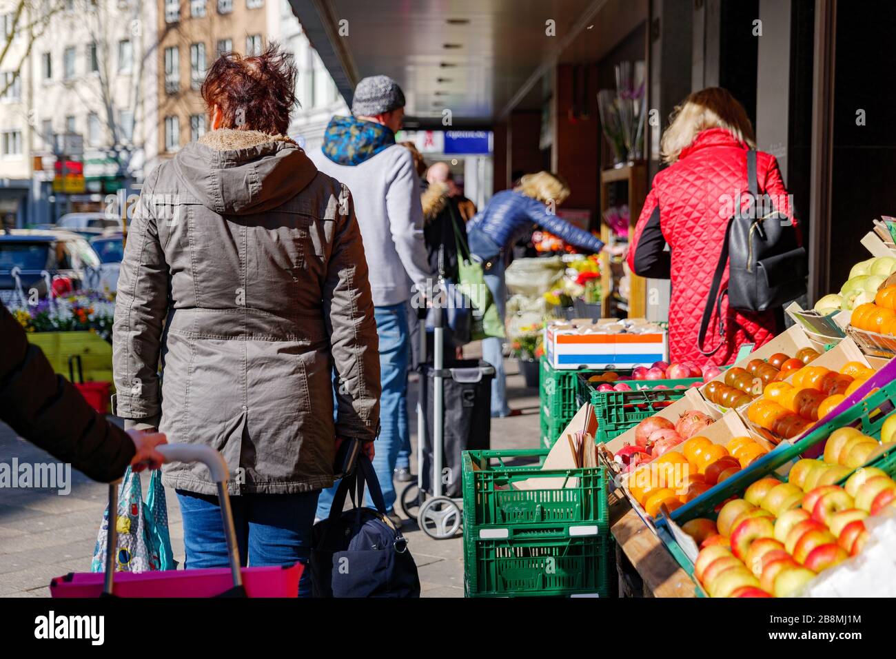 Selected focus, European people queue outside in front of food stall ...