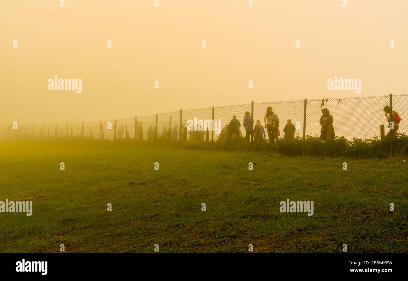 Prisoners behind fence hi-res stock photography and images - Alamy