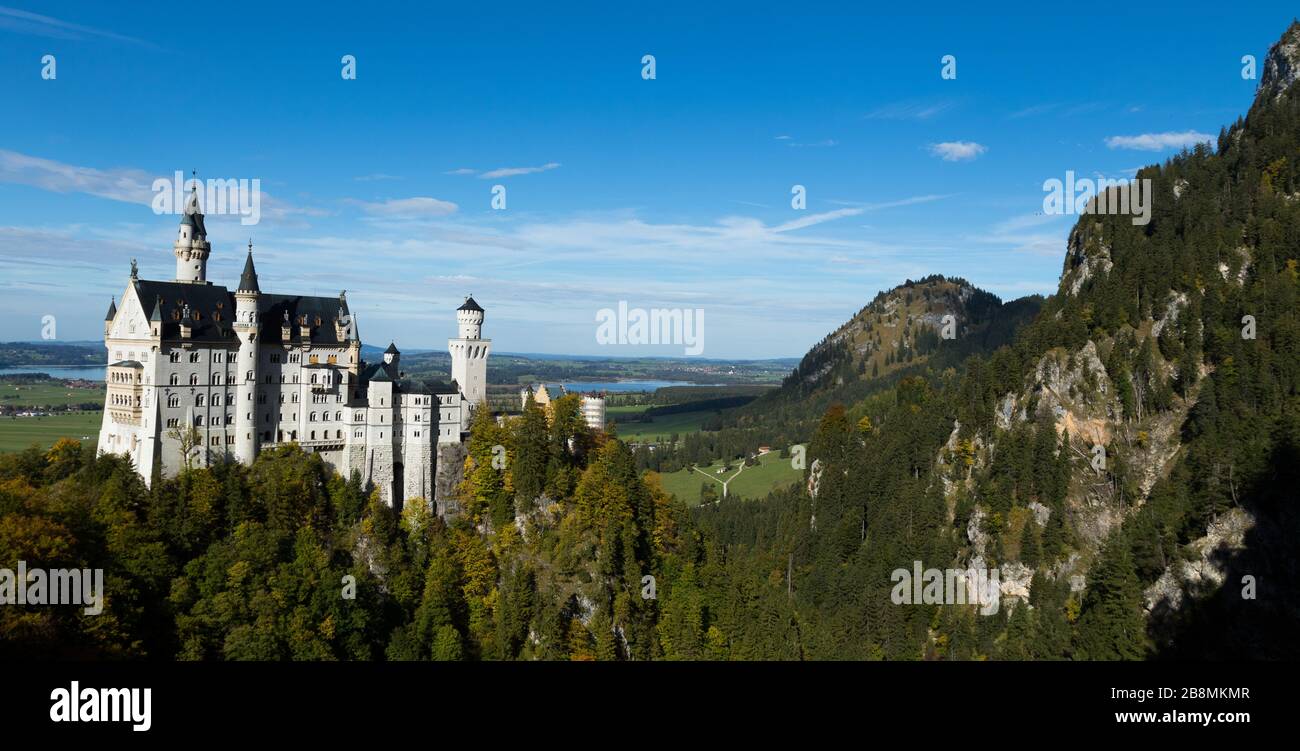 Neuschwanstein Castle, in the back with scenic mountain landscape near ...