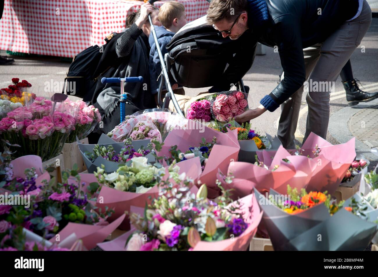 Hackney and covid 19. Broadway market. Flowers on sale for Mothers Day ...
