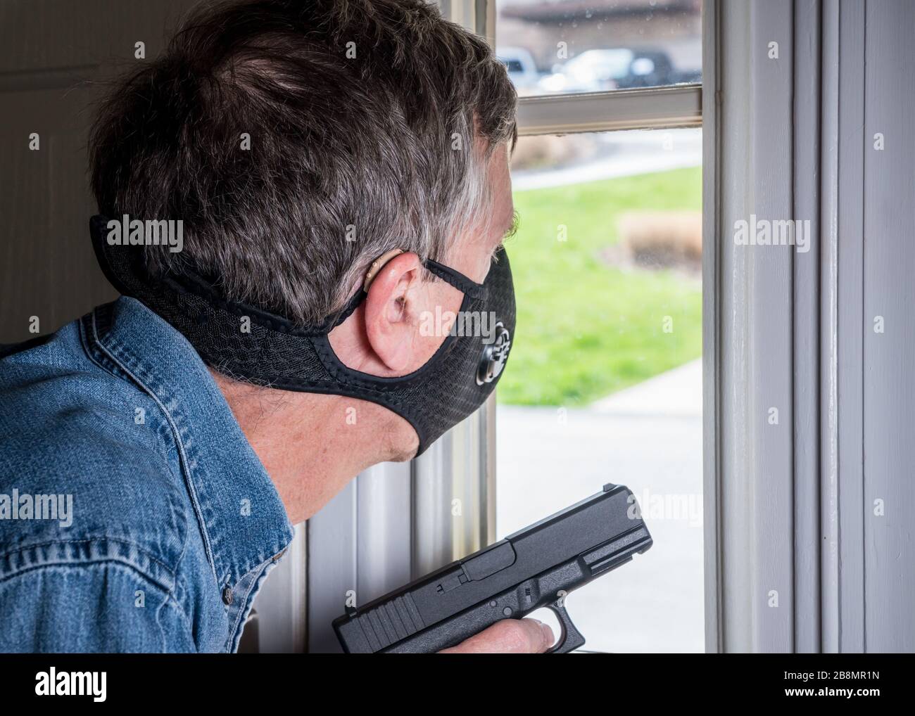 Gun man mask hi-res stock photography and images - Alamy