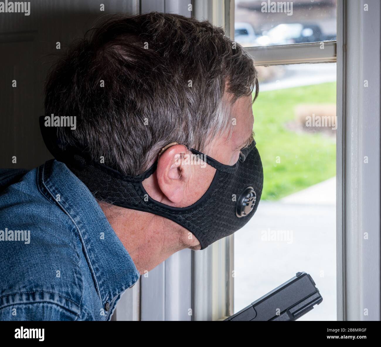 Gun man mask hi-res stock photography and images - Alamy