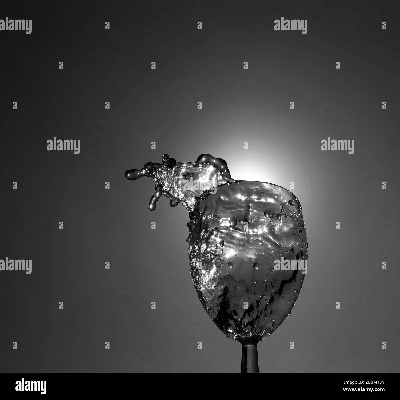 Glass sparkling wine splash Black and White Stock Photos & Images - Alamy