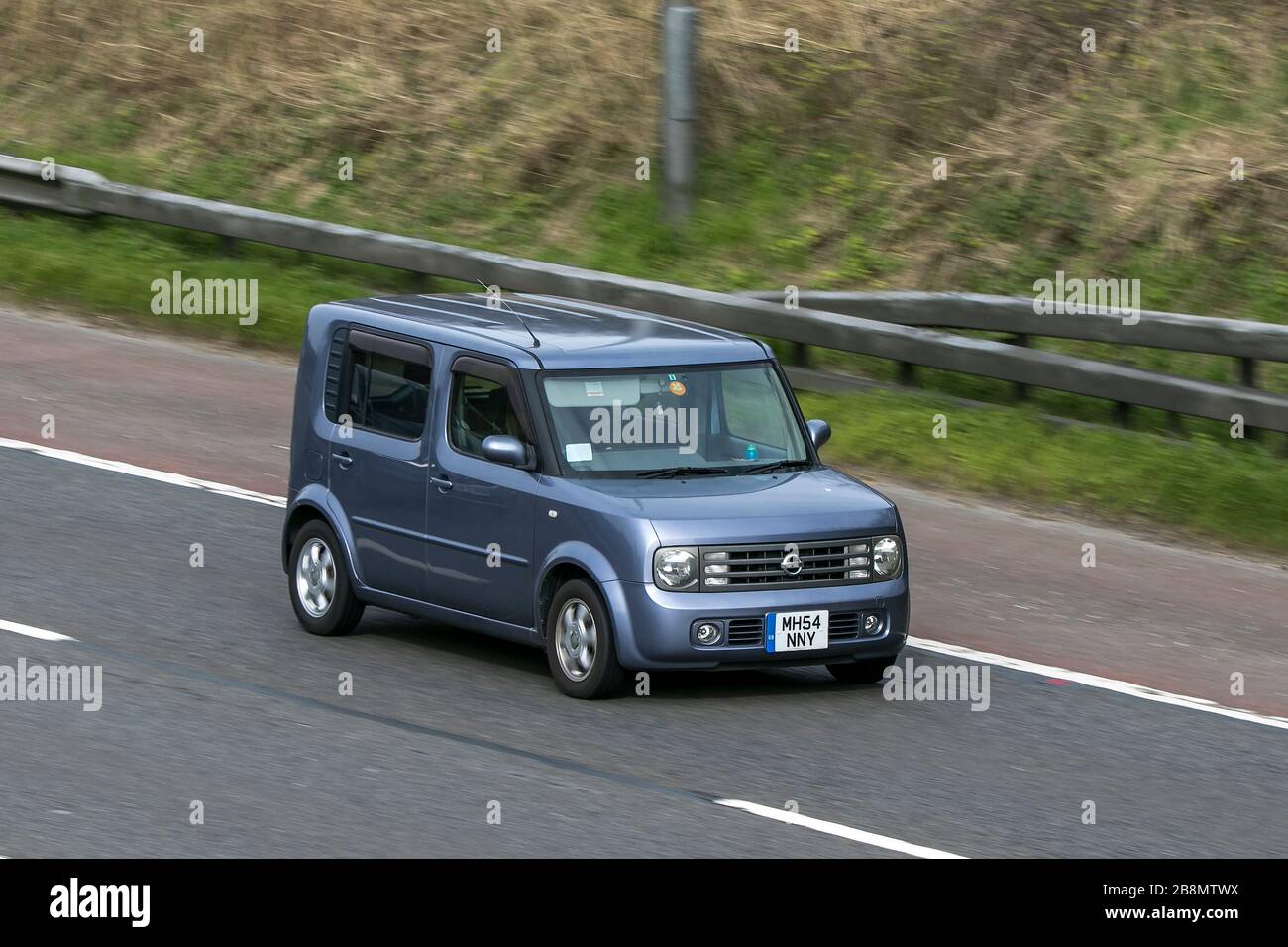 2016 blue Nissan cube Blue Car 1380cc Petrol driving on the M6 motorway ...