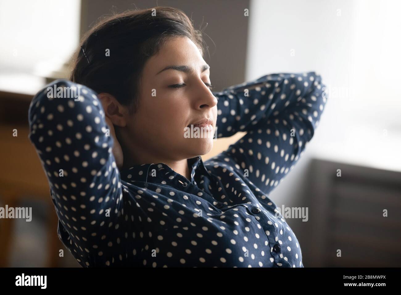 Person leaning back on chair hi-res stock photography and images - Alamy
