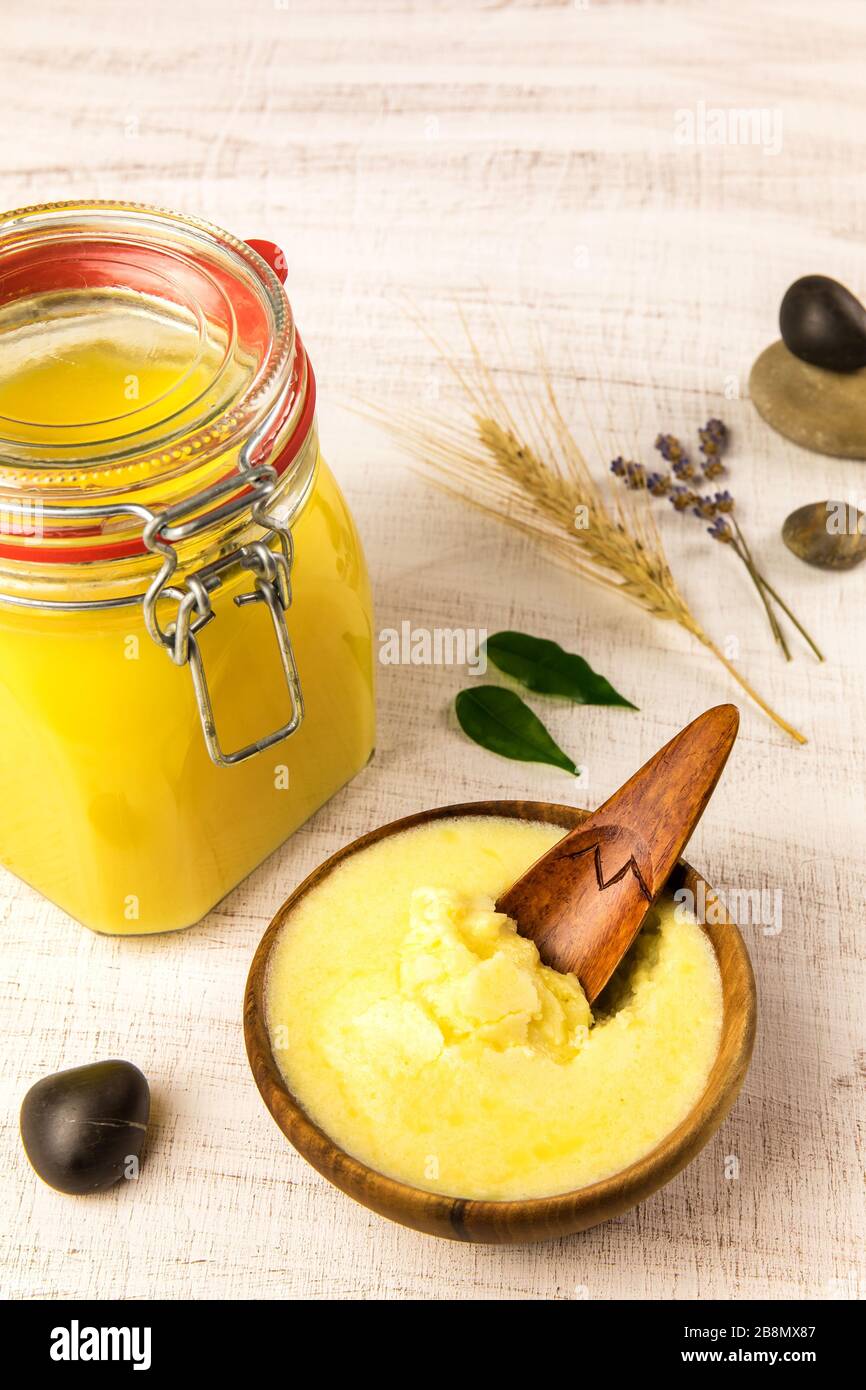 Desi ghee in wooden spoon hi-res stock photography and images - Alamy