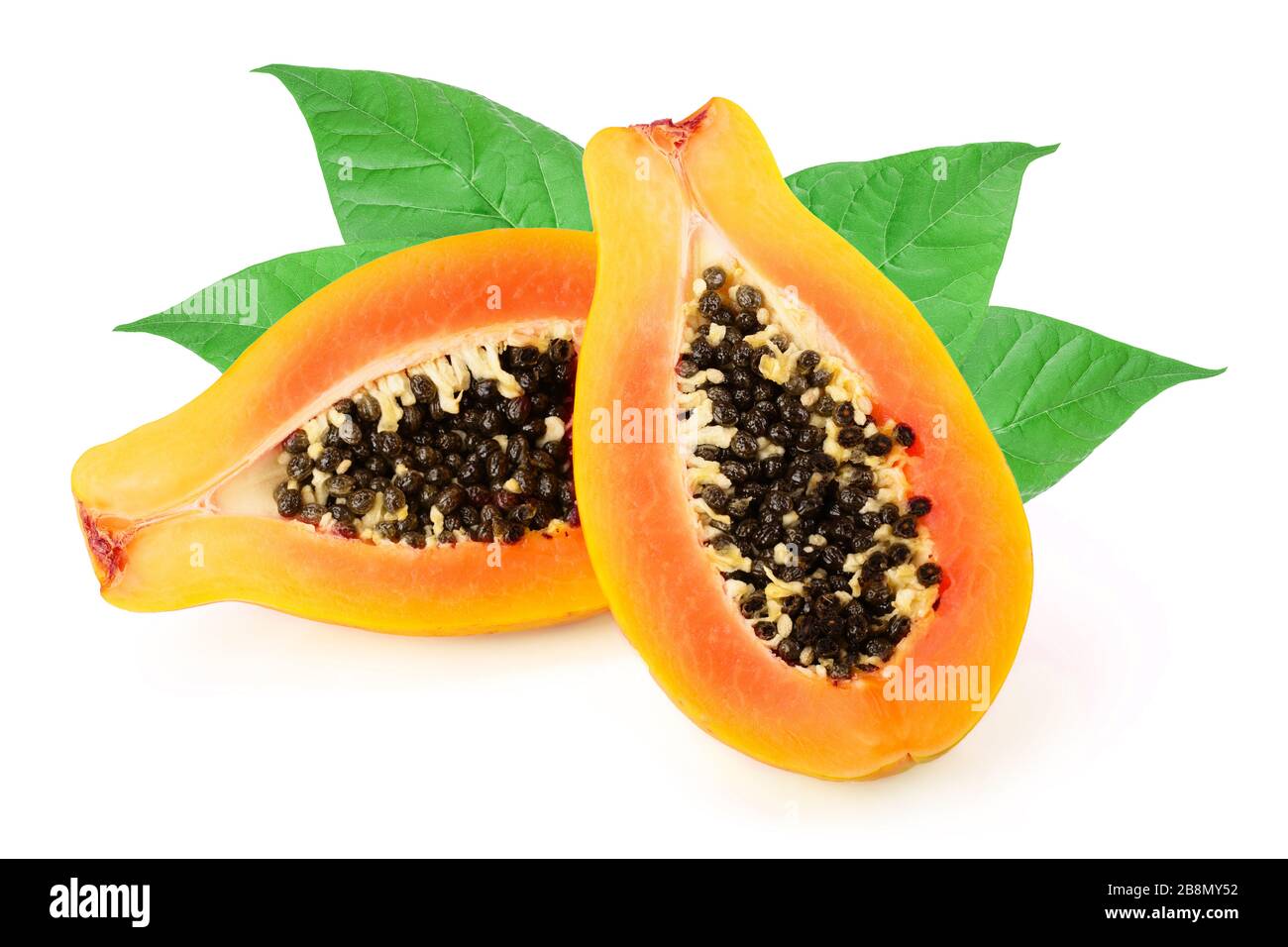 half of ripe papaya with leaves isolated on a white background Stock ...