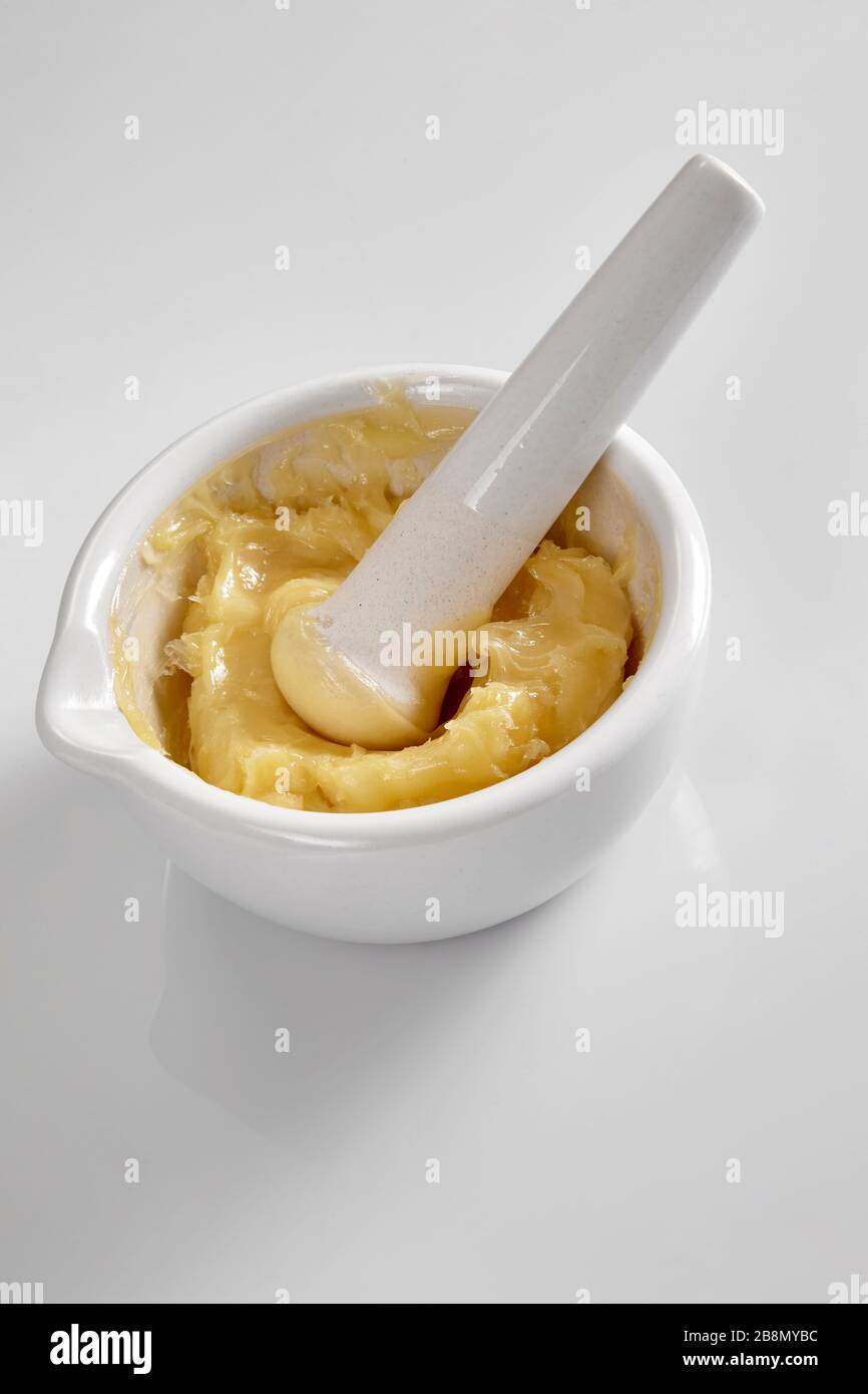 Close up of mixing medicine in the mortar and pestle Stock Photo - Alamy