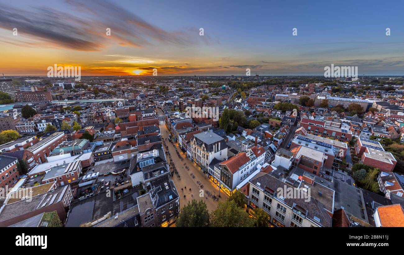 Aerial Skyline view of historic Groningen city centre under setting sun ...