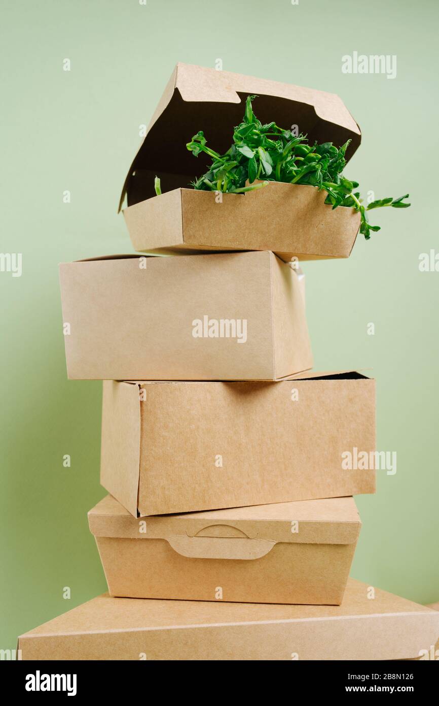 Image of eco-friendly packaging and peas, boxes lie on top of each ...