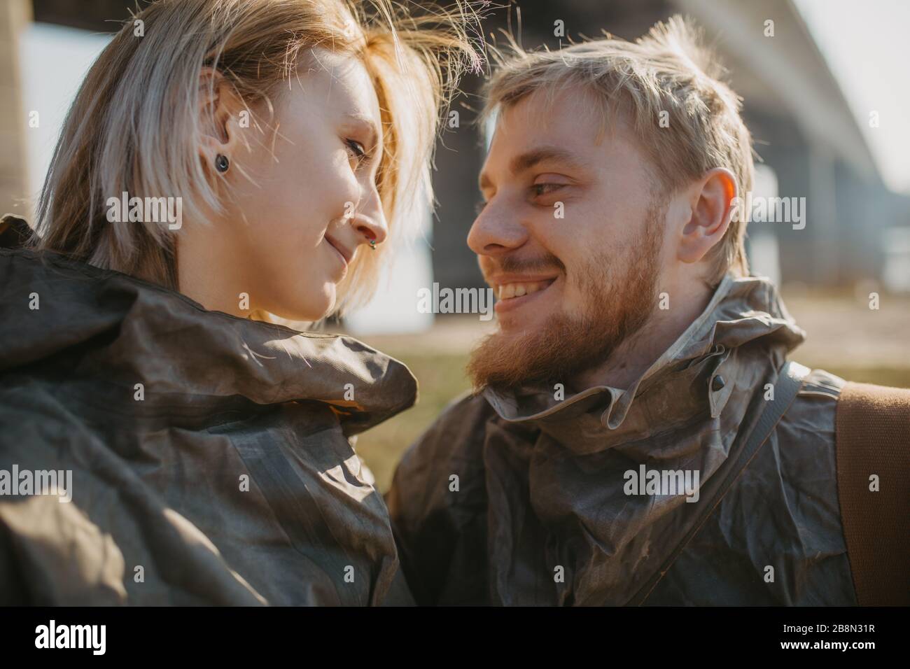 Portrait of couple in love in NBC protective suits. Concept of ...