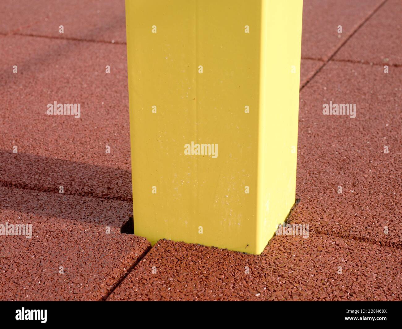 Yellow iron bar on workout playground. The beam holds horizontal ...