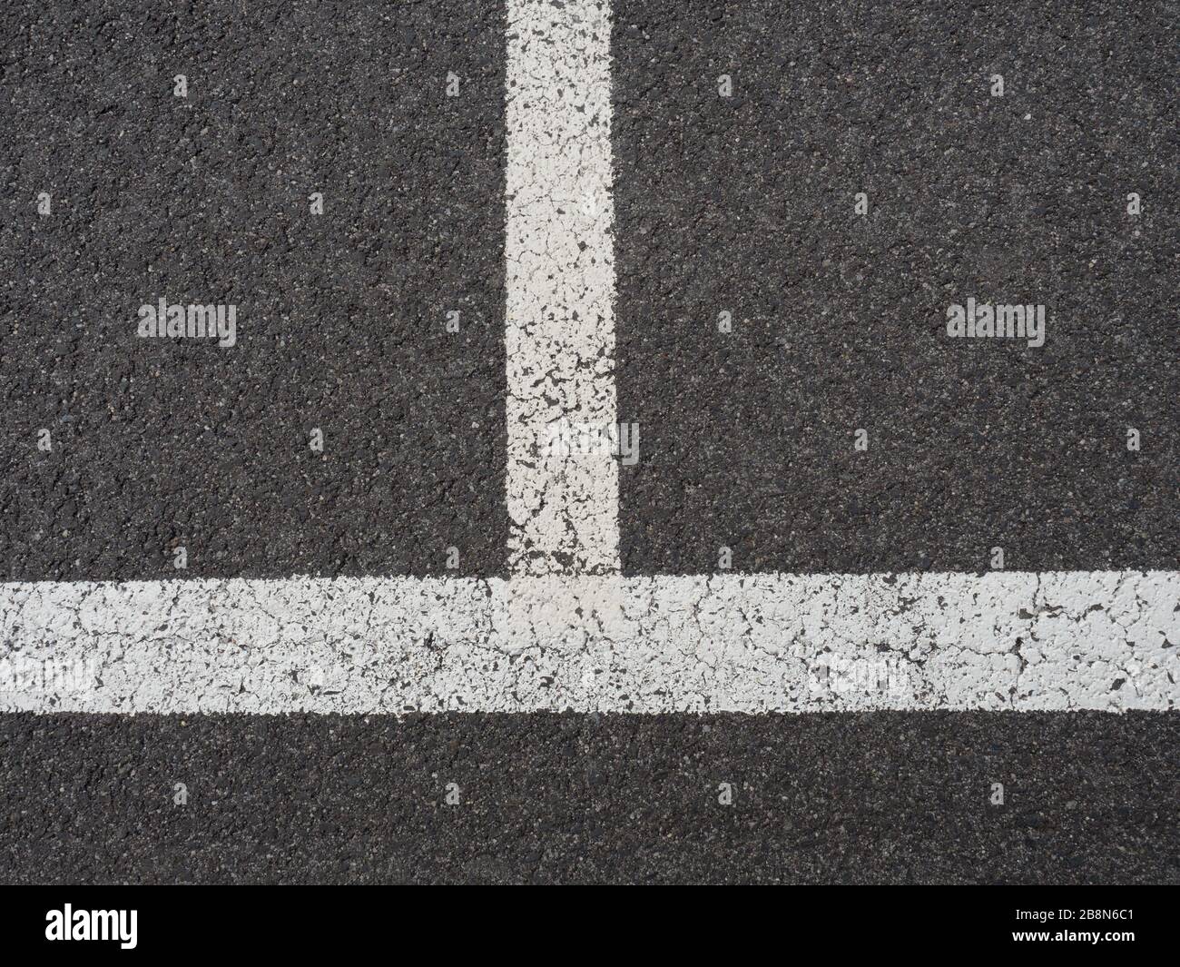 Lines painted with white color on empty parking spaces. Painter road ...