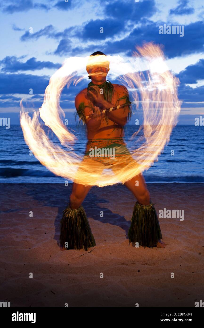 Fire knife dancer on the beach at Olowalu, Maui, Hawaii Stock Photo - Alamy