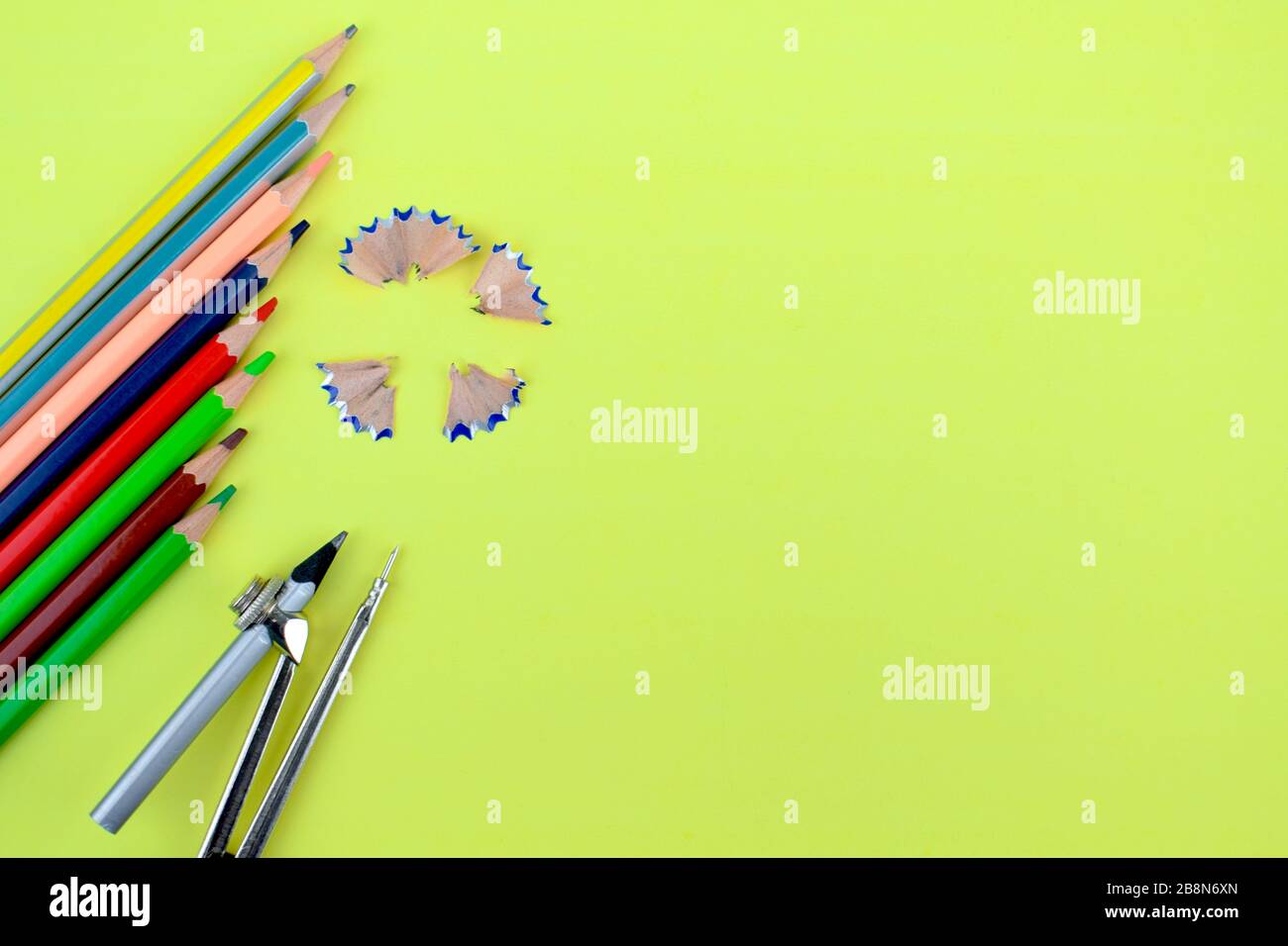 Different colored wood pencils and a pencil attached to a pencil ...