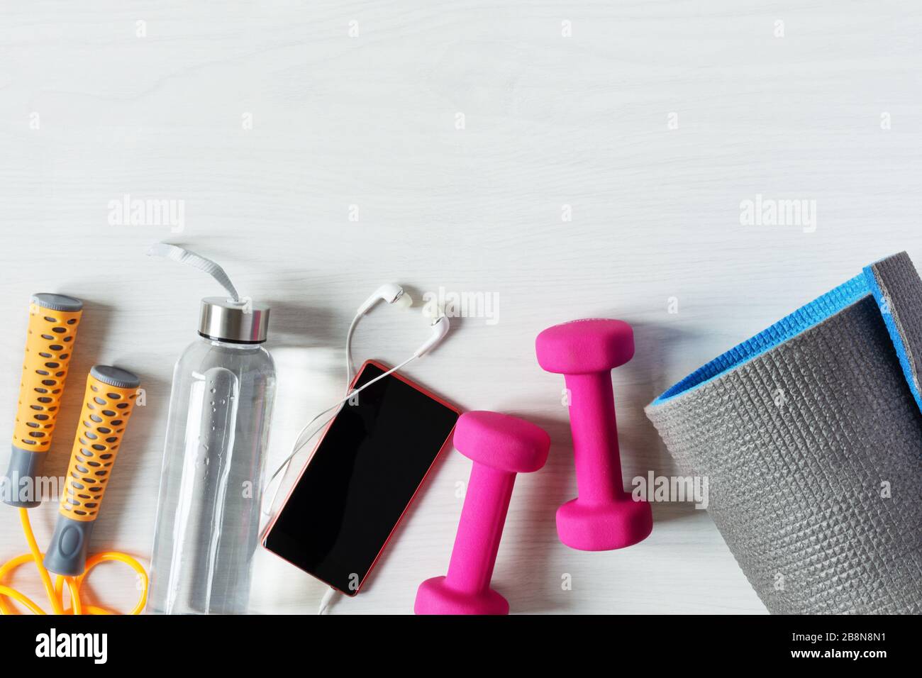 Fitness equipment top view with copy space. Fitness concept. Dumbbells ...