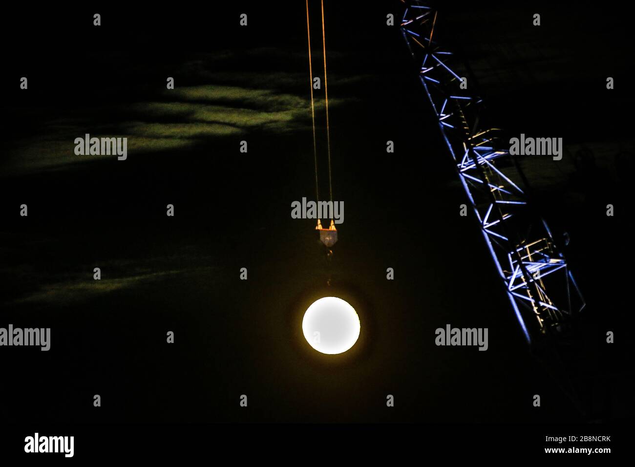 the moon is hanging in a wire Stock Photo - Alamy