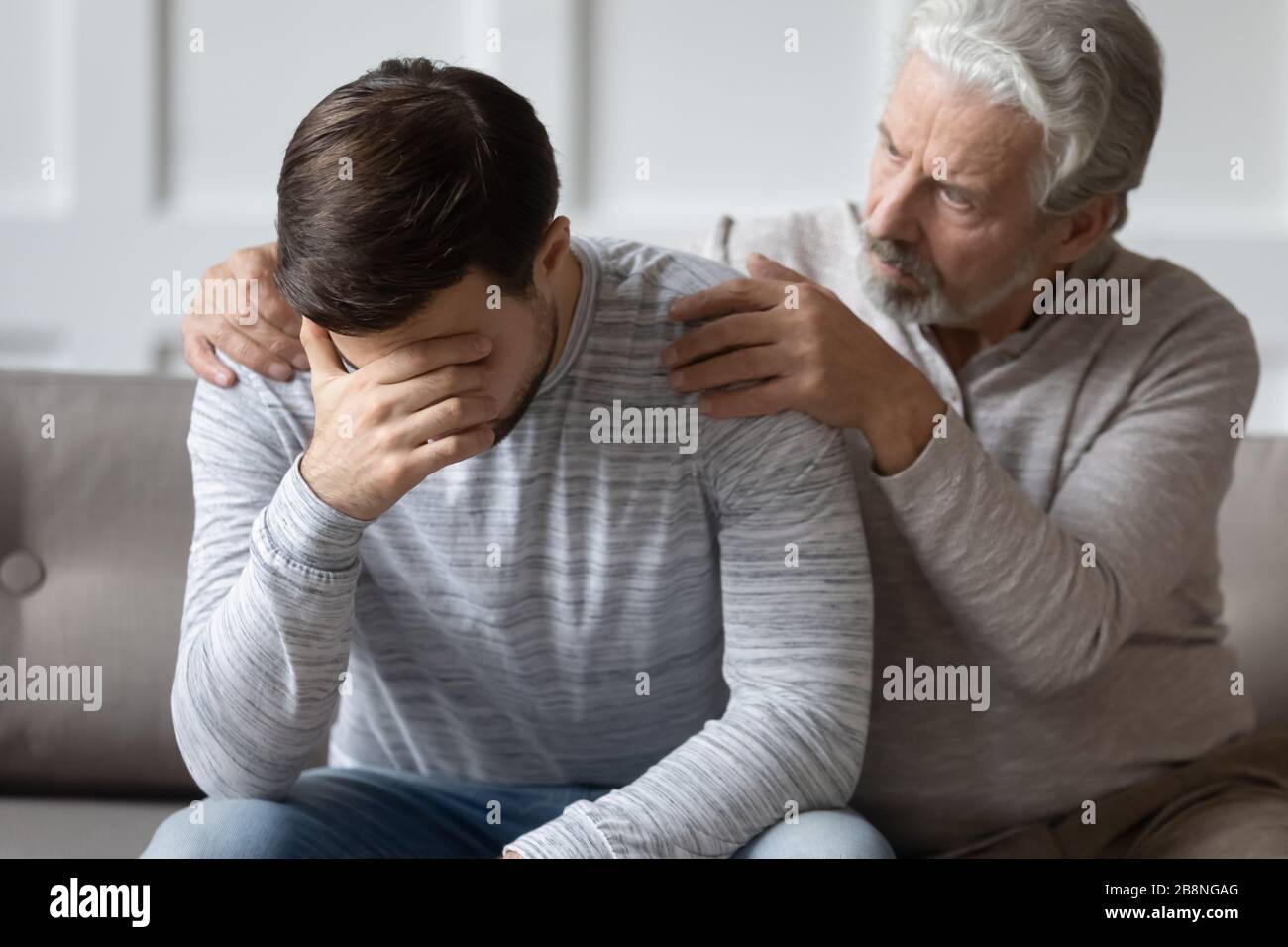 Caring adult son support hi-res stock photography and images - Alamy