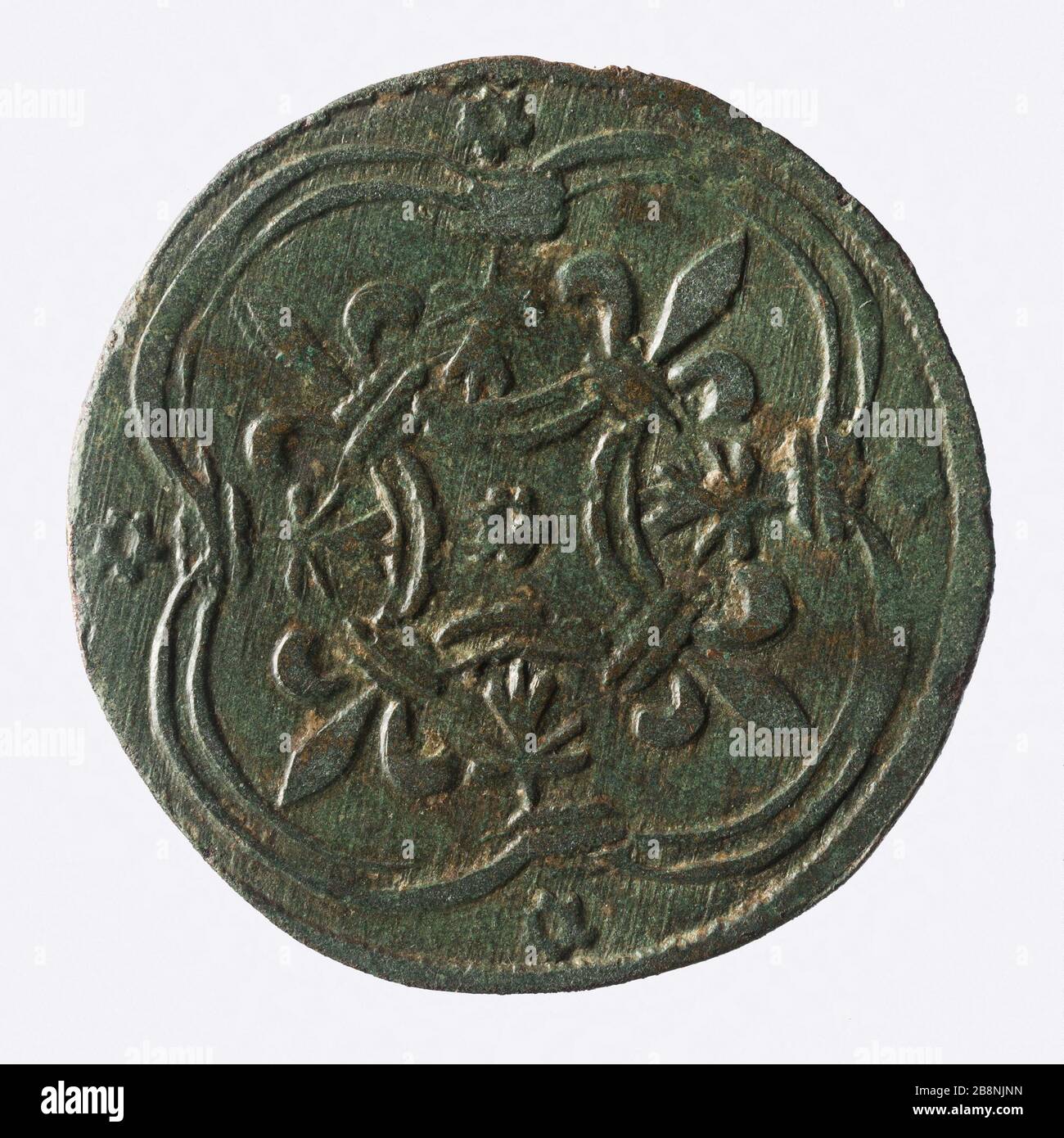 account token to the ECU three lilies topped by two ringlets ...