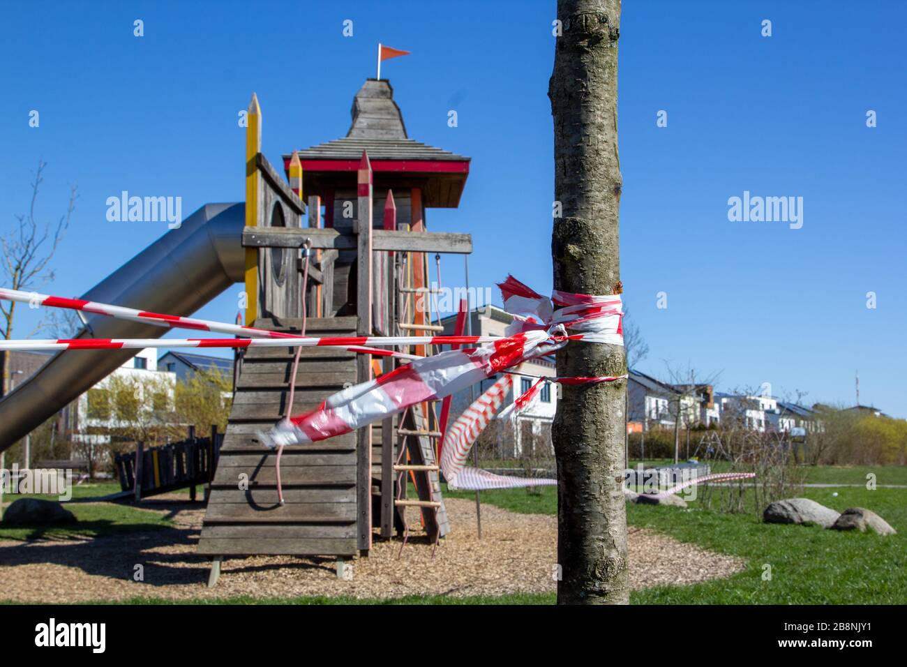 Playground cordoned off because of the corona virus. German word ...