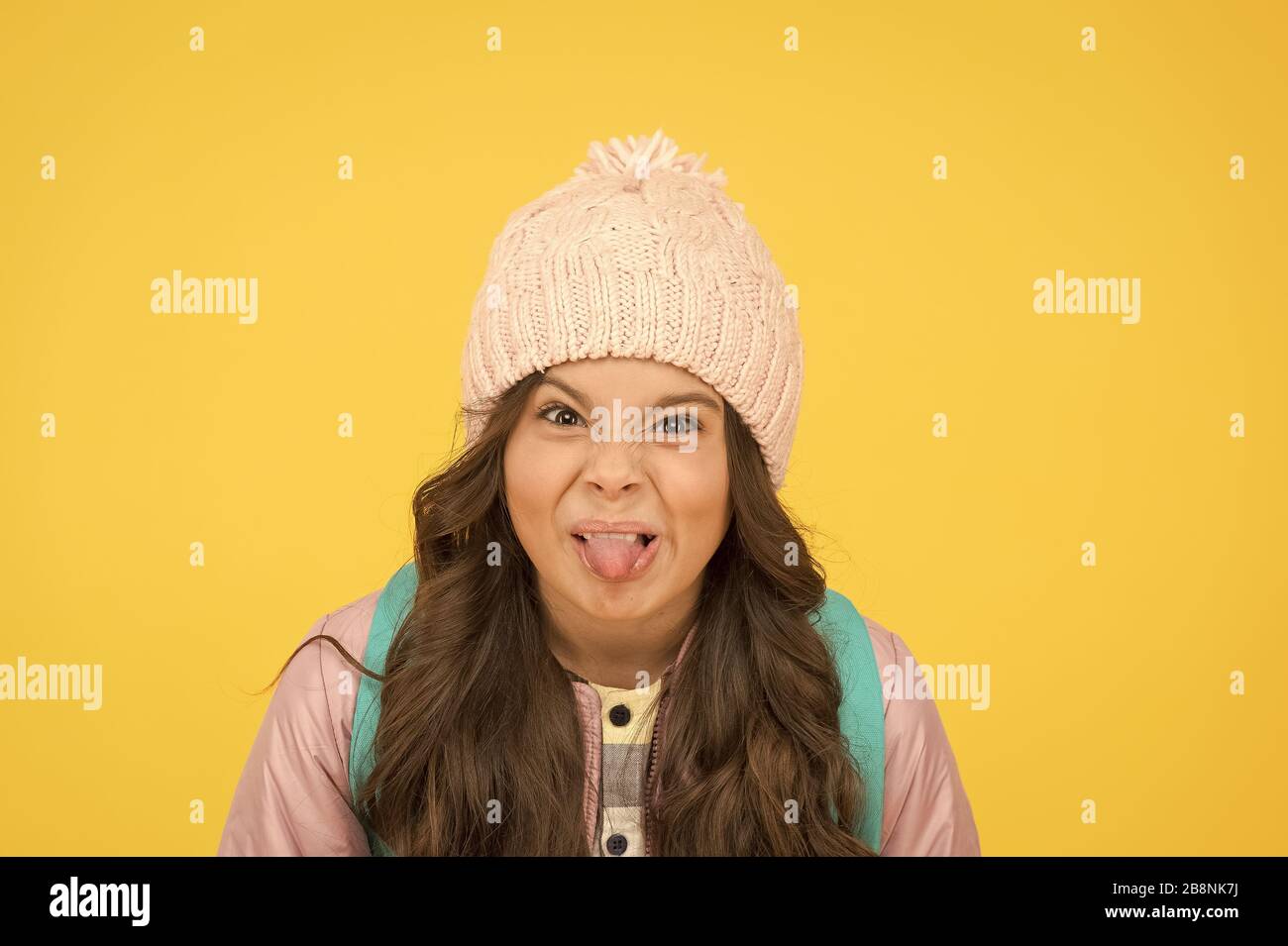 Ugh, yuck. Little schoolchild stick tongue. Little kid make grimace ...