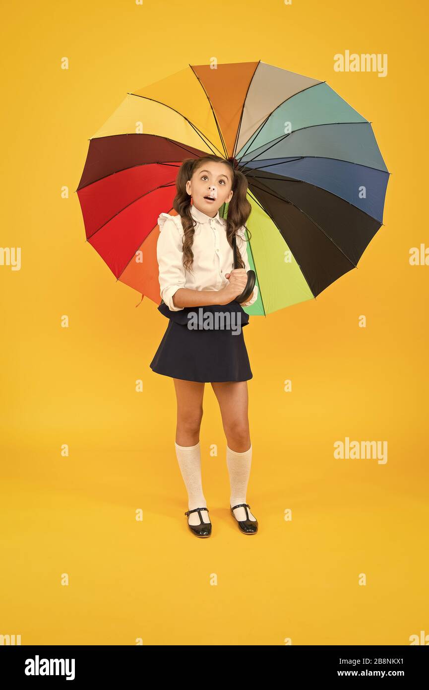 On way to school. Fashion accessory. Rainy september. Accessory for rainy day. Fancy schoolgirl ...