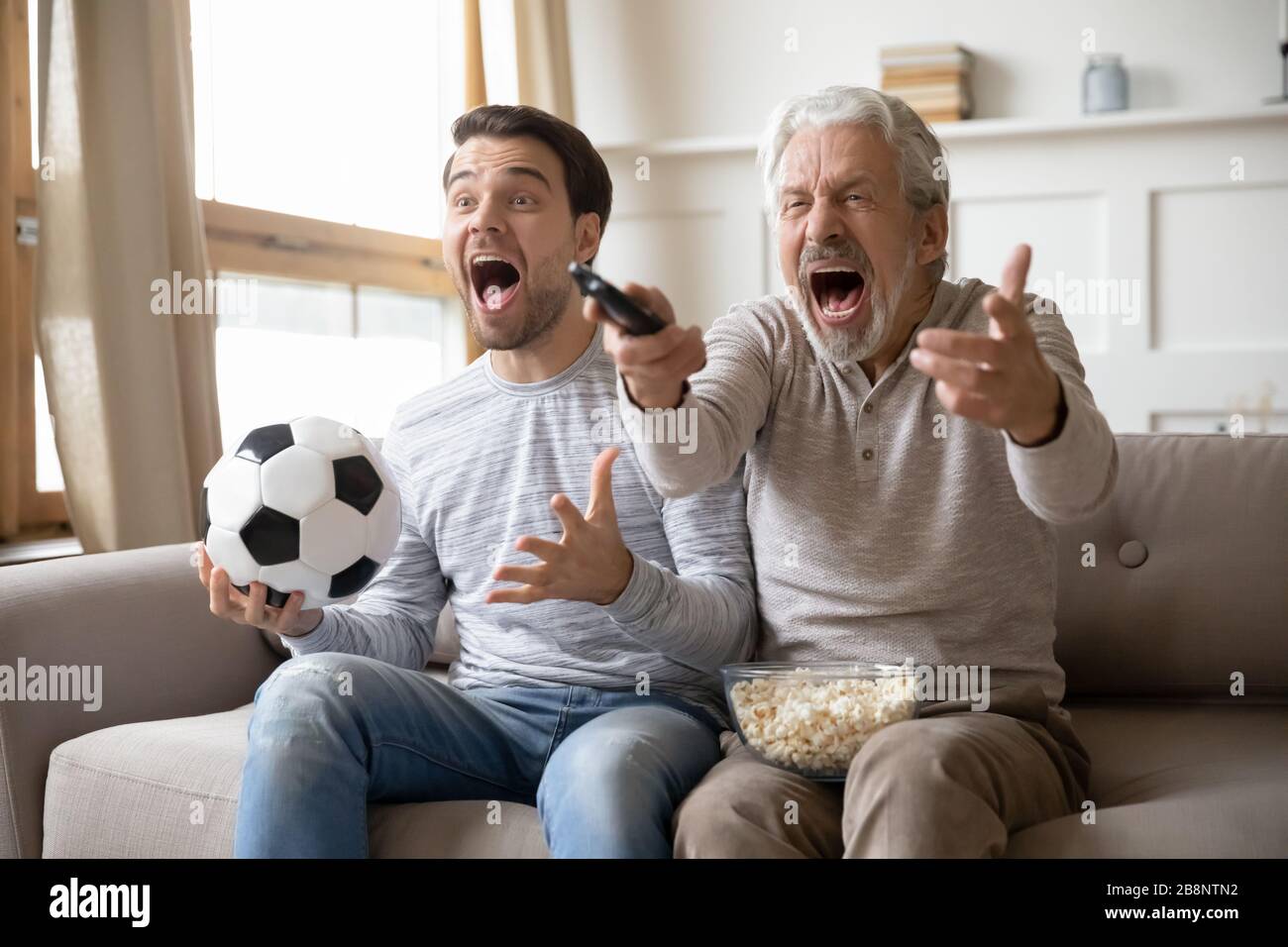 Watching sport candid hi-res stock photography and images - Alamy