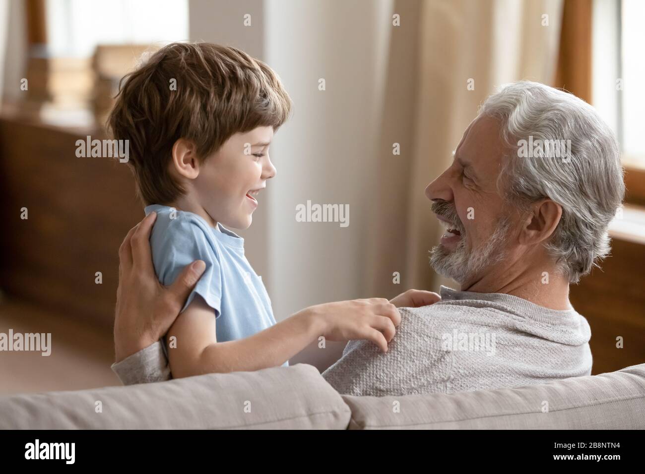 Grandfather grandson conversation hi-res stock photography and images ...
