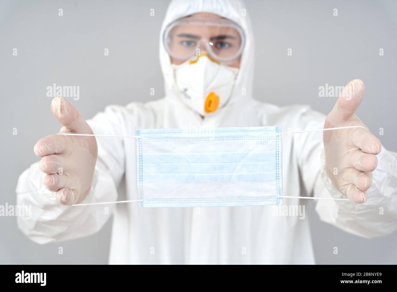 Doctor showing medical face mask hi-res stock photography and images ...
