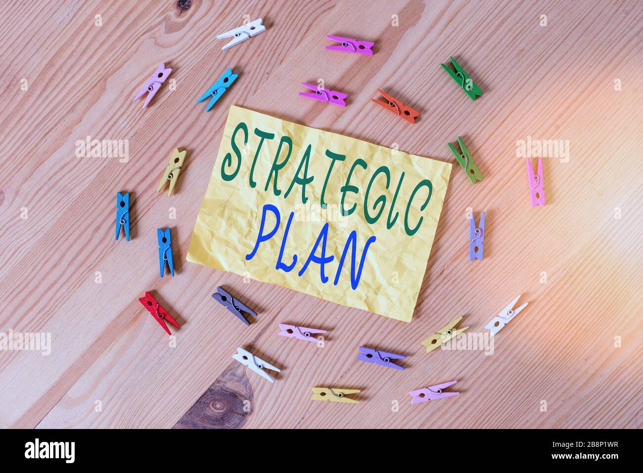 Writing note showing Strategic Plan. Business concept for a systematic ...