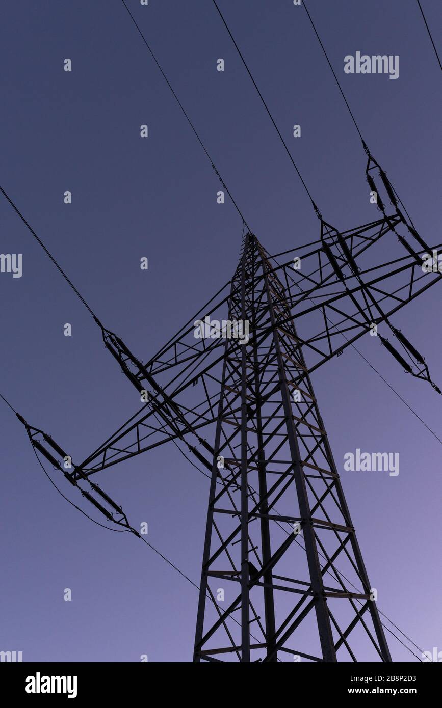 Electricity pylon dusk blue sky hi-res stock photography and images - Alamy