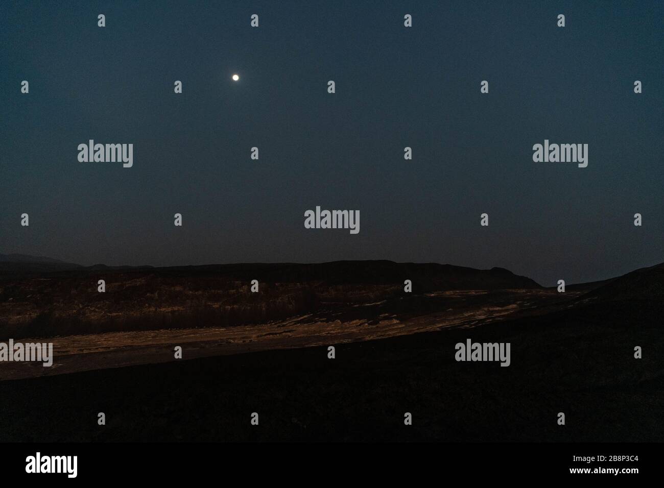 Africa, Djibouti, Ardoukoba. Landscape of Ardoukoba volcano under moon ...