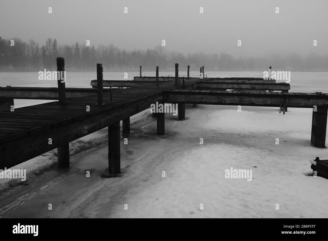 B&W shot of the dock in front of HMCS Carleton, on a foggy spring ...