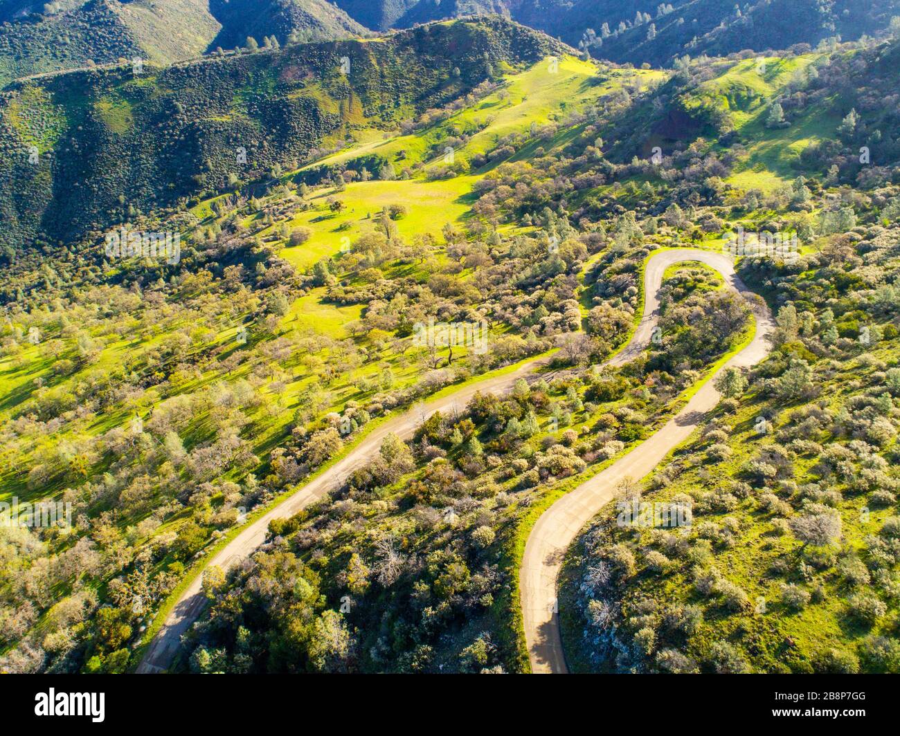 Aerial of winding road on Figueroa Mountain above the Santa Ynez Valley ...