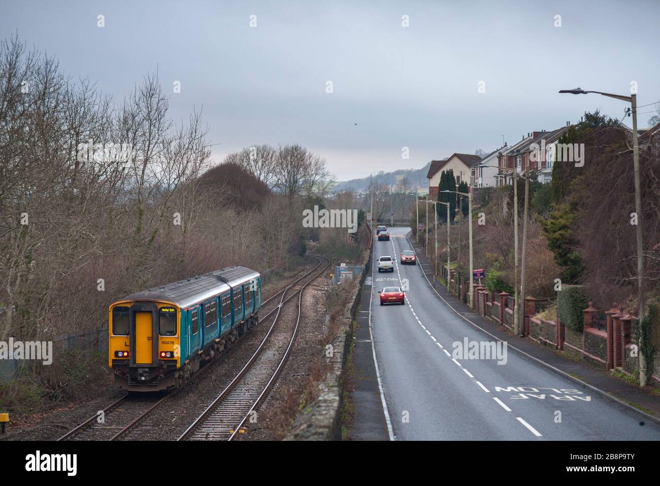 Transport for Wales class 150 sprinter train 150278 passing Troedyrhiw (south of Merthyr Tydfil ...