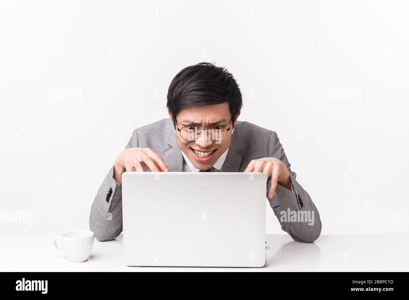 Portrait of distressed, pressured and stressed young asian office ...