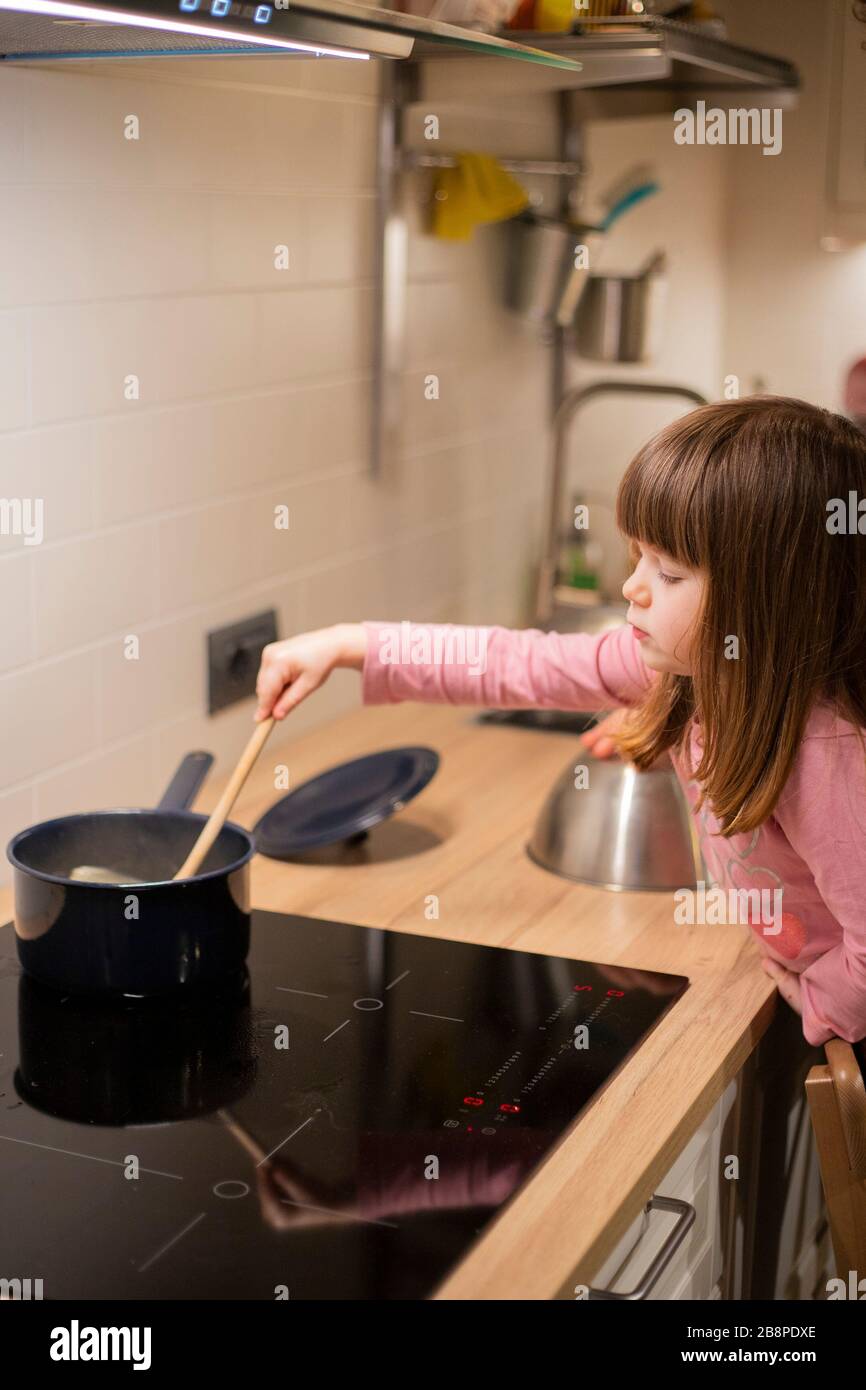 Child pot stove hi-res stock photography and images - Alamy