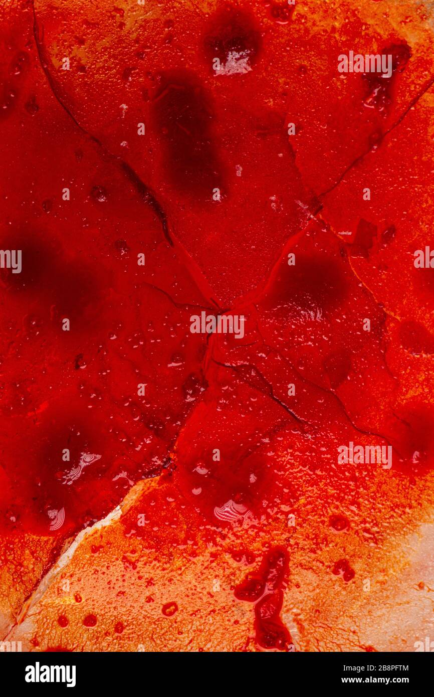 Image of blood-colored liquids mixed with other organic fluids ...