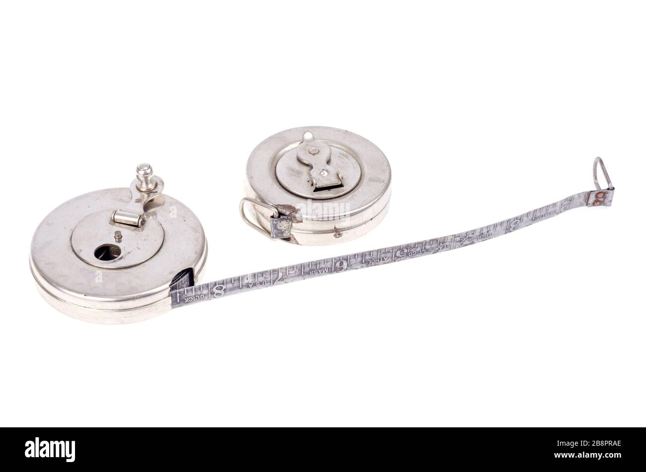 Old scratched metal tape measure, measuring on white. Studio Photo ...