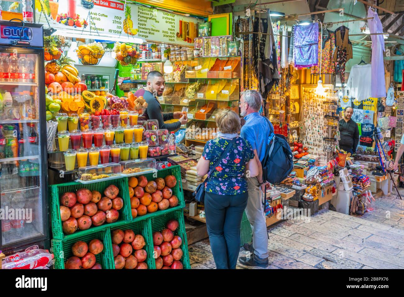 A colorful fruit stand selling fruit juices in the old city of ...