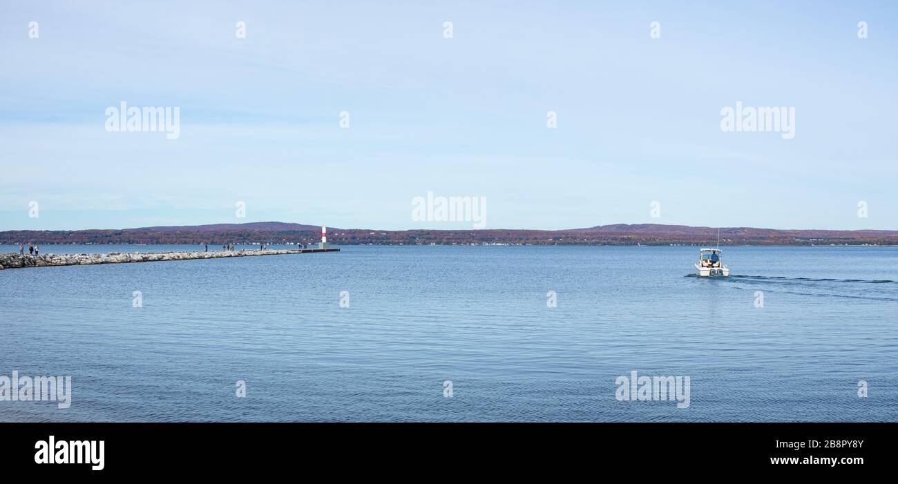 View of Petoskey Harbor, with the Breakwater and lighthouse, in ...