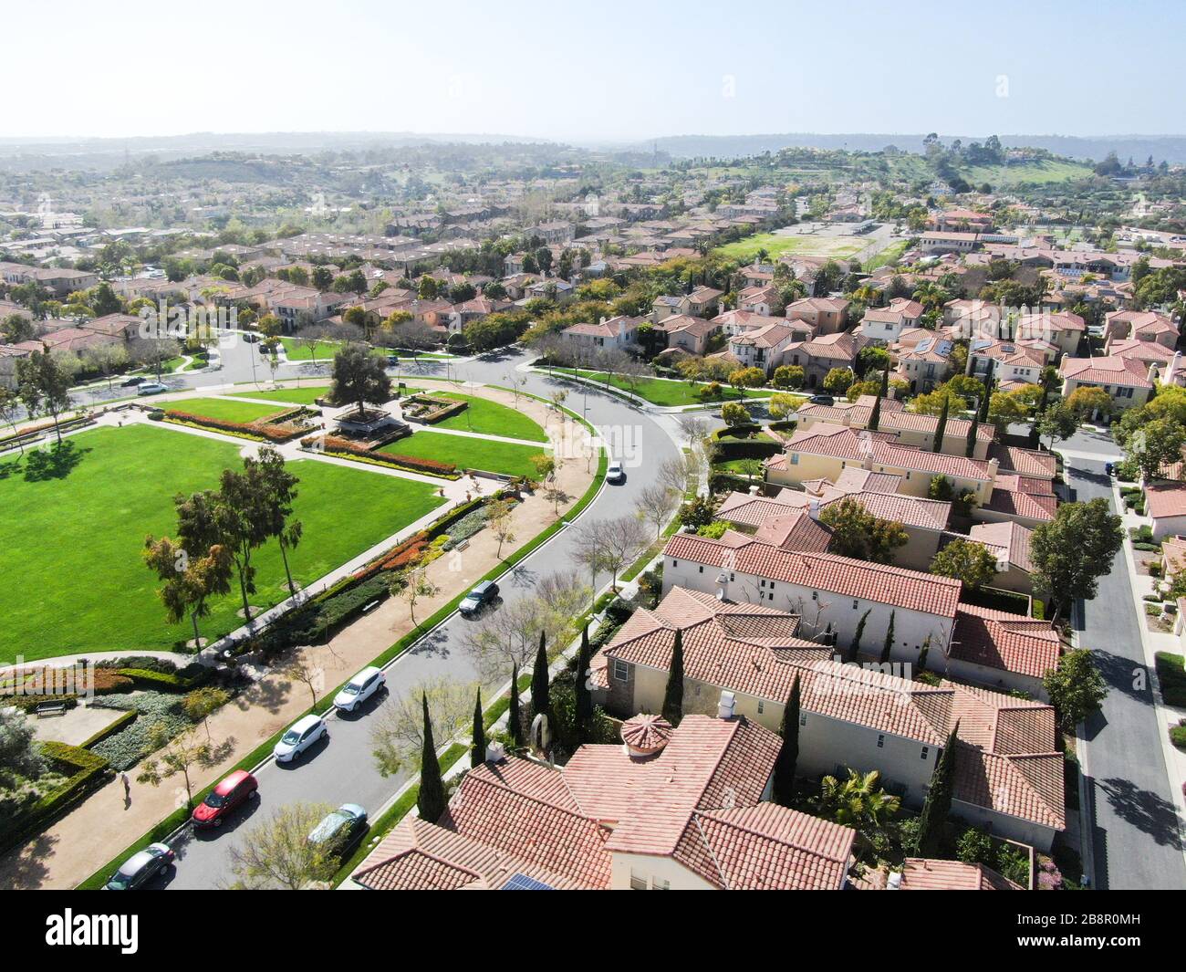 Aerial view suburban neighborhood with identical villas next to each ...